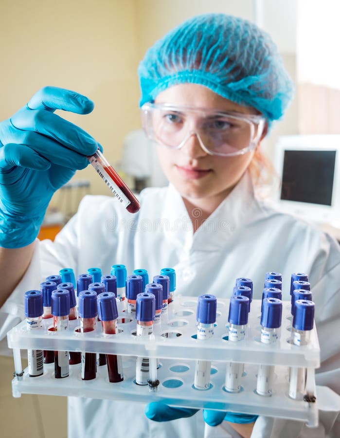 Medic Staff at Work in the Laboratory. Background. Stock Image - Image ...