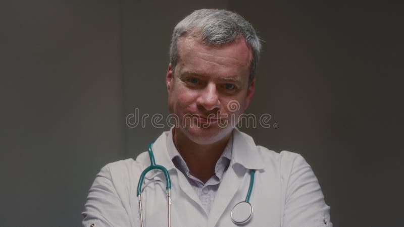 Medic in Work Uniform Engrossed in Attentive Conversation with Client ...