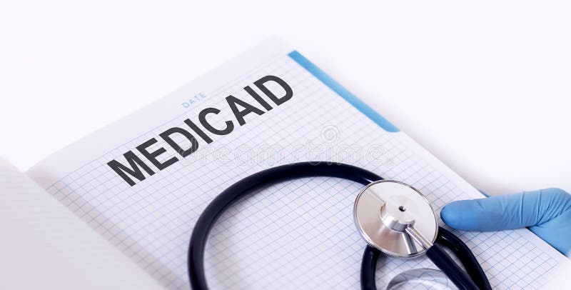 MEDICAID . Notepad with Text in Hand of Medicine Stock Photo - Image of ...