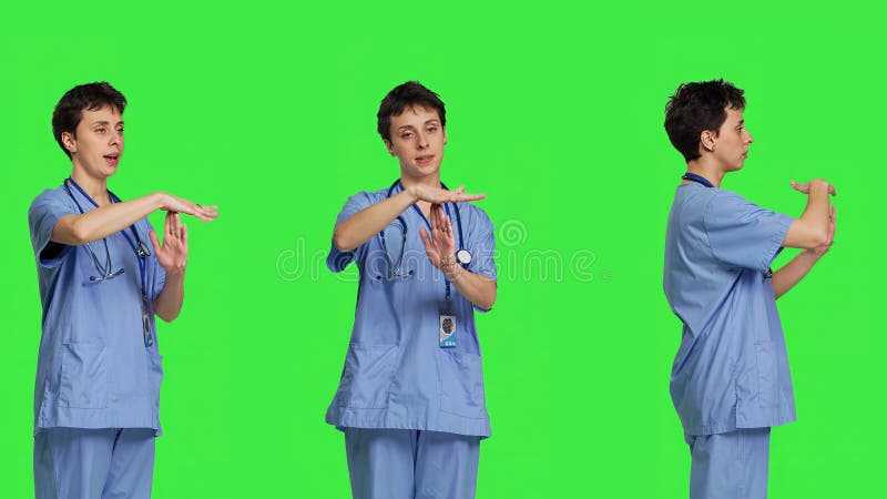 Medical Assistant Giving Timeout Symbol Against Greenscreen Backdrop ...