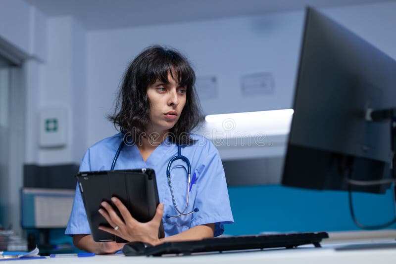 Medical Assistant Using Tablet with Touch Screen for Healthcare Stock ...