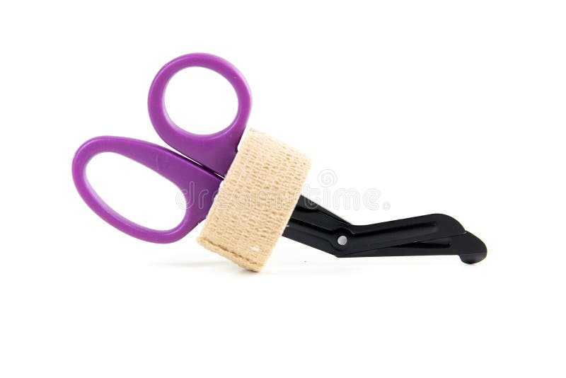 Medical Bandage Scissors Inside a Roll of Stretch Tape Stock Image ...