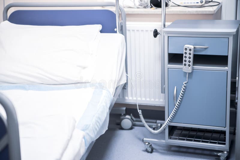 Medical Bed with Remote Control in the Room Stock Image - Image of ...