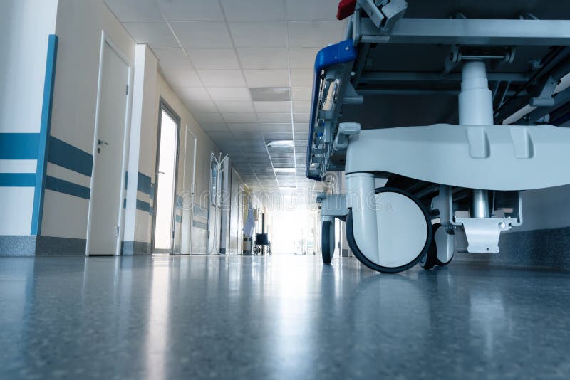 Medical Bed on Wheels in the Hospital Corridor Stock Image - Image of ...