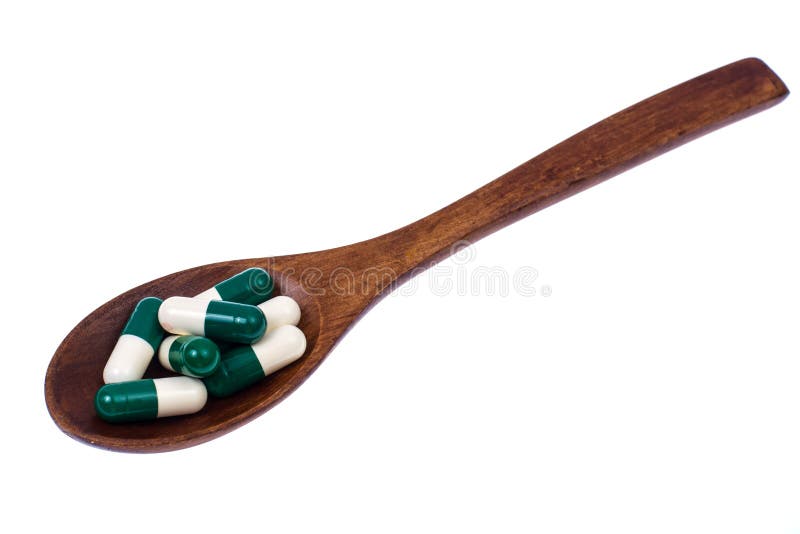 Medical Capsules in Wooden Spoon Stock Image - Image of nature, organic ...