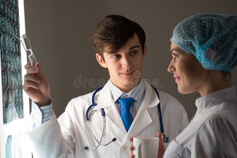 Medical Colleagues Confer Near the X-ray Image Stock Image - Image of ...