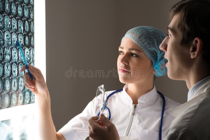 Medical Colleagues Confer Near the X-ray Image Stock Image - Image of ...