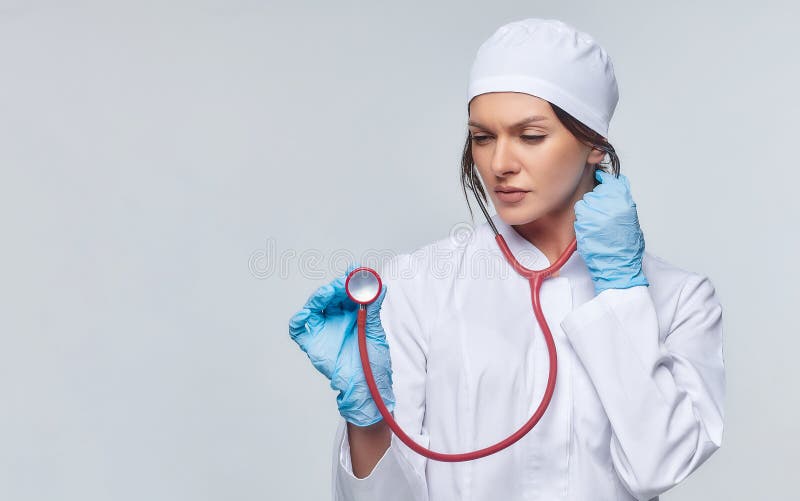 Medical Concept Of A Female Doctor In A White Coat With A Stethoscope