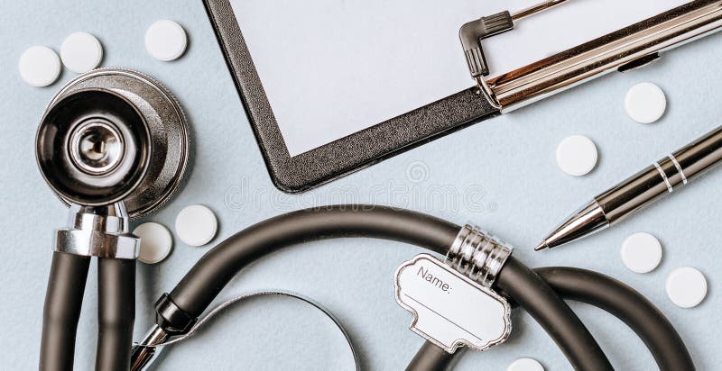 Medical Concept Flat Lay with Stethoscope Pills Notepad Pen on Doctor ...