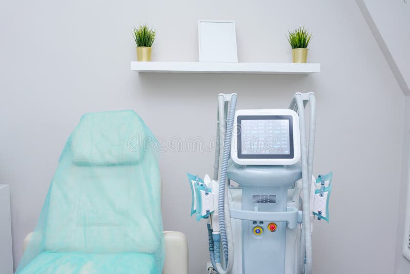 A Medical Device is on a Table Next To a Chair Stock Image - Image of ...
