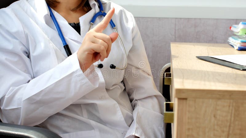 Medical Doctor Explaining Something for Patient by Making Hands ...