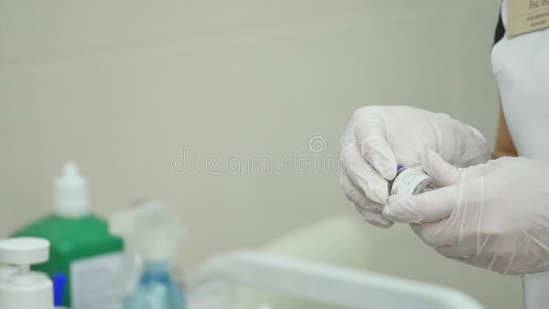 Doctor and Nurse Put on Glasses they Stand Next To the Patient All ...