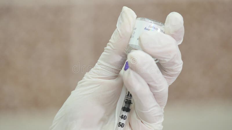 Medical Doctor or Nurse Loading Syringe for Injection Stock Video ...