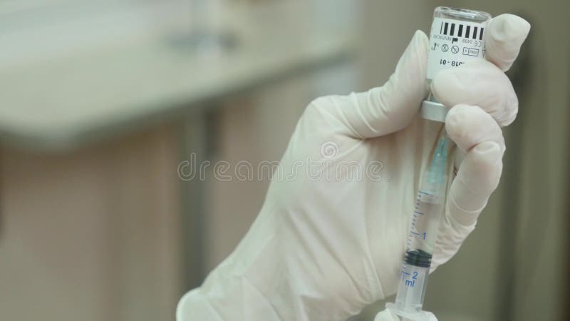 Medical Doctor or Nurse Loading Syringe for Injection Stock Video ...