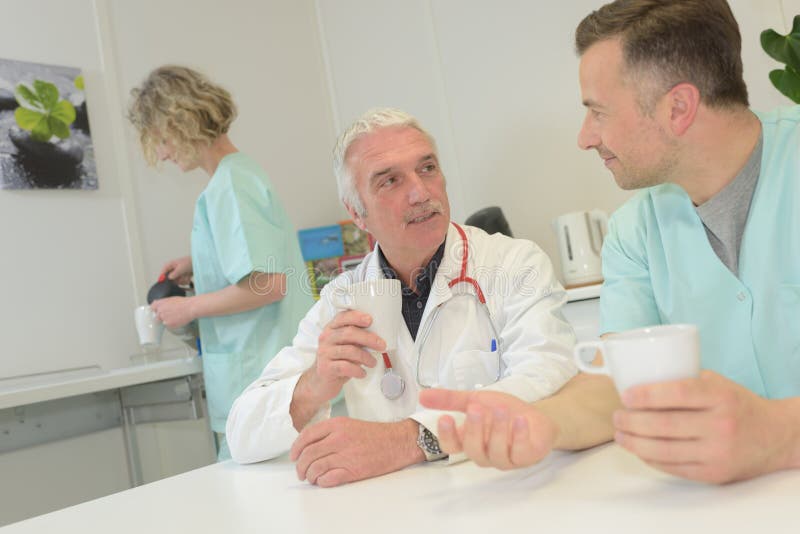 Medical Doctor Team Taking Coffee Break Stock Image - Image of marble ...