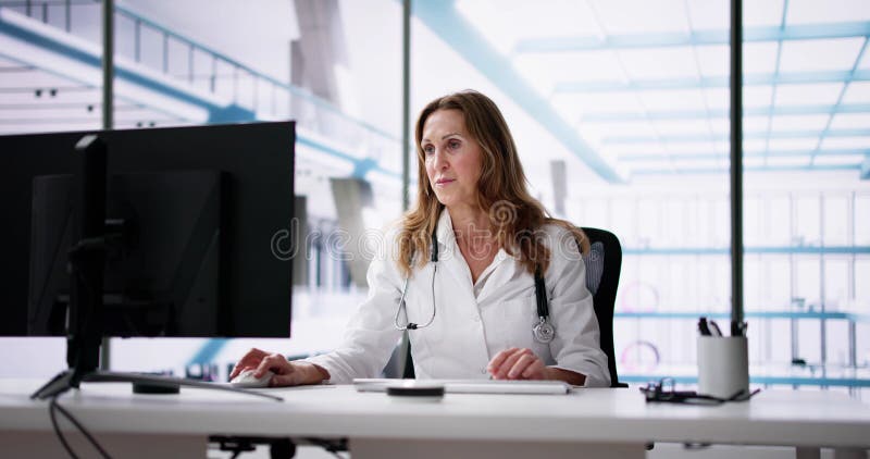 Medical Doctor Using Computer in Hospital Stock Image - Image of ...