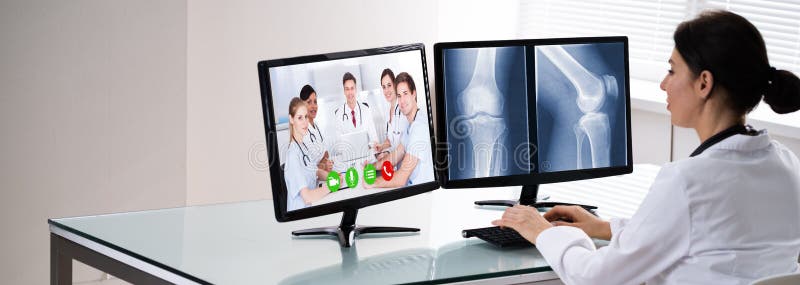 Doctor Using Digital Tablet at Desk Stock Photo - Image of healthcare ...