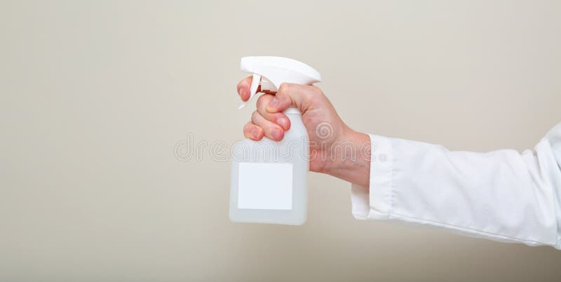 Medical Doctor Using a Spray Cleaner Stock Image - Image of clinic ...