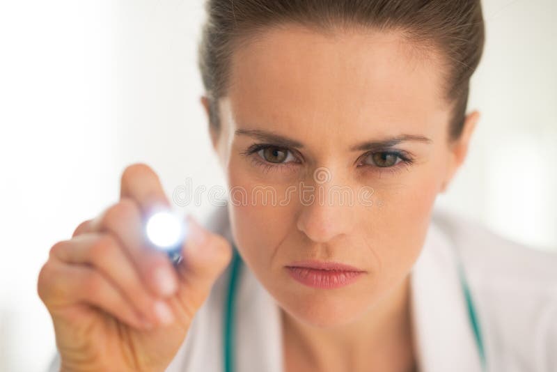 Medical Doctor Woman Examining Using Flashlight Stock Photo - Image of ...