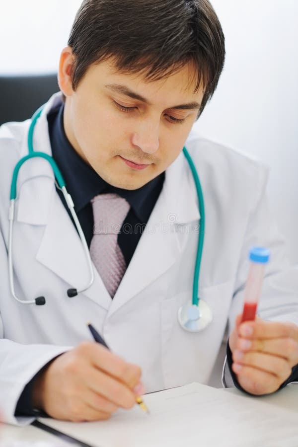 Medical Doctor Working with Blood Sample Stock Photo - Image of office ...