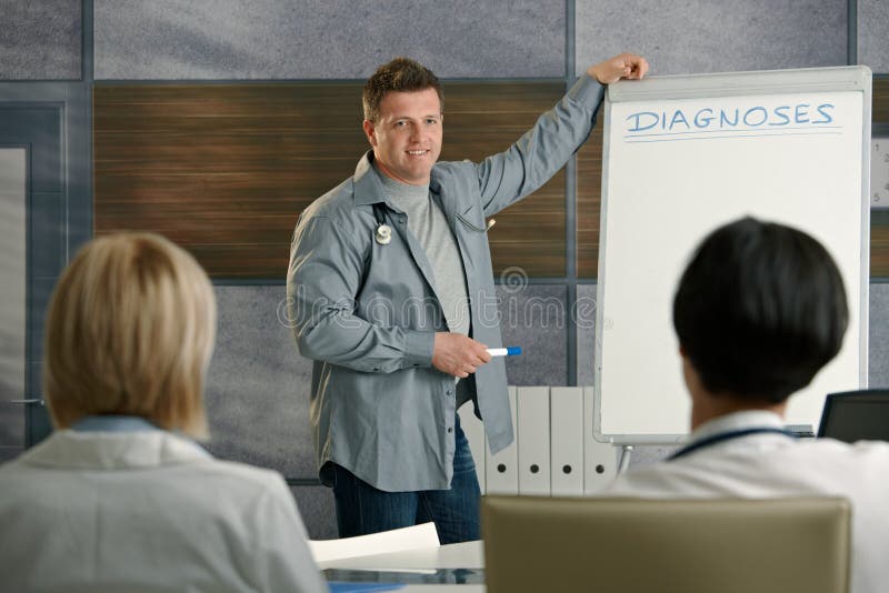 Medical Doctors Listening To Presentation Stock Image - Image of ...