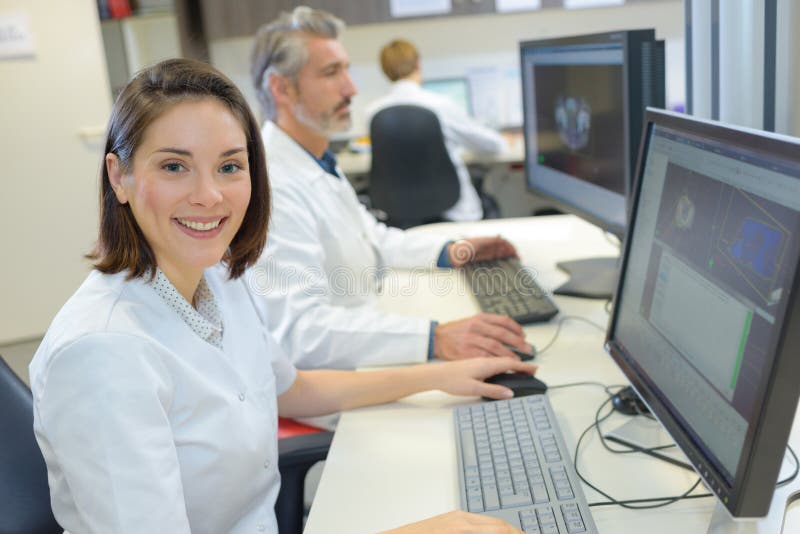 Medical Doctors Using Computer Stock Photo - Image of computer, doctor ...