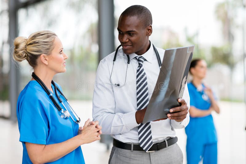 Medical Doctors Working Together Stock Image - Image of aged ...