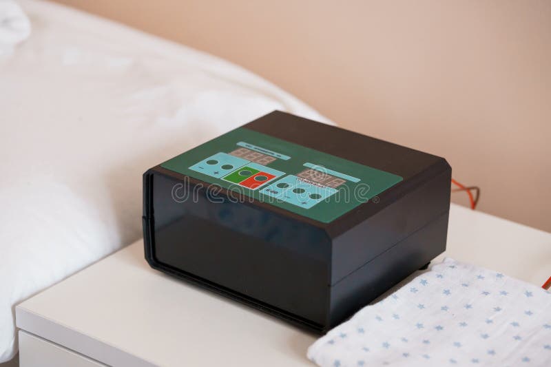 Medical Electric Device on Bedside Table in a Healthcare Setting Stock ...