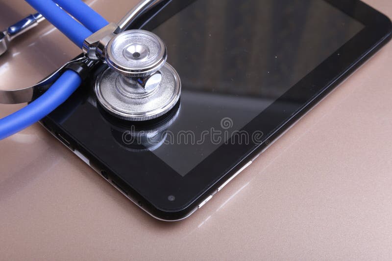 Medical Equipment Blue Stethoscope and Tablet on Desk Stock Photo ...