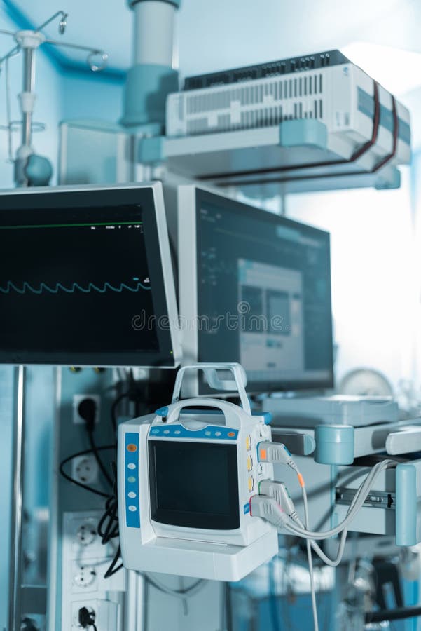 Medical Equipment with Screens in Surgery Room Stock Photo - Image of ...