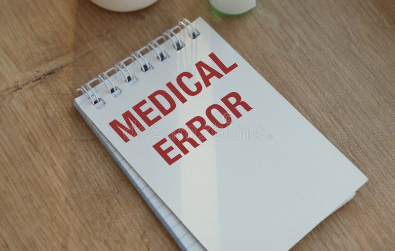Medical Error Text on a Paper with Pills and Stethoscope on Table ...