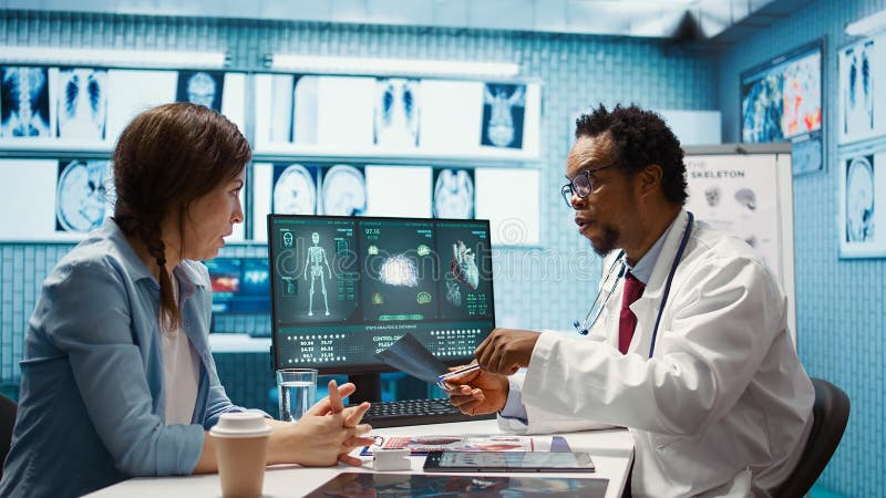 Medical Expert Specialist Explaining the X Ray Imaging for a Diagnosis ...