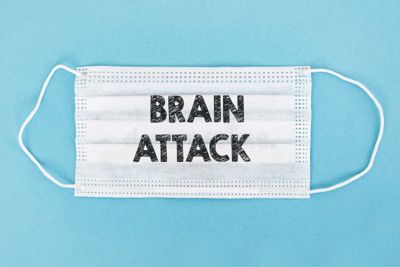 Medical Face Mask with BRAIN ATTACK Text on Blue Background Stock Image ...