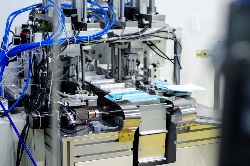 Medical Face Mask Making Machine. Mask Production Line Stock Photo ...