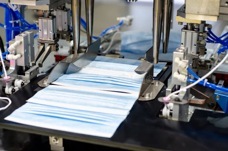 Medical Face Mask Making Machine. Mask Production Line Stock Photo ...
