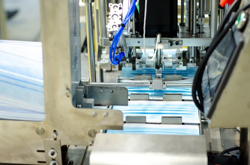 Medical Face Mask Making Machine. Mask Production Line Stock Image ...