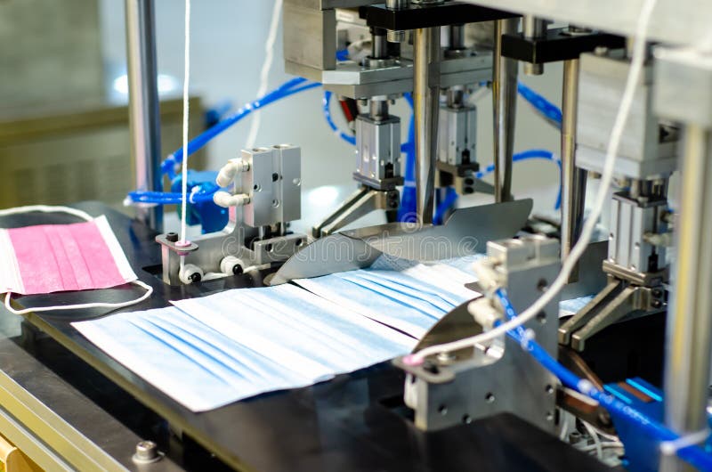 Medical Face Mask Making Machine. Mask Production Line Stock Photo ...