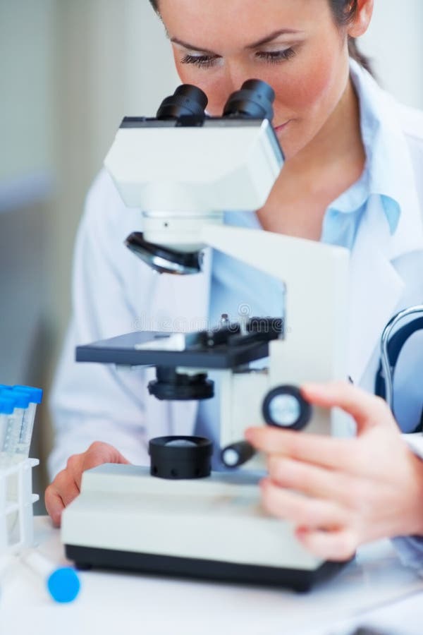Medical - Female Nurse Looking in Microscope Stock Photo - Image of ...