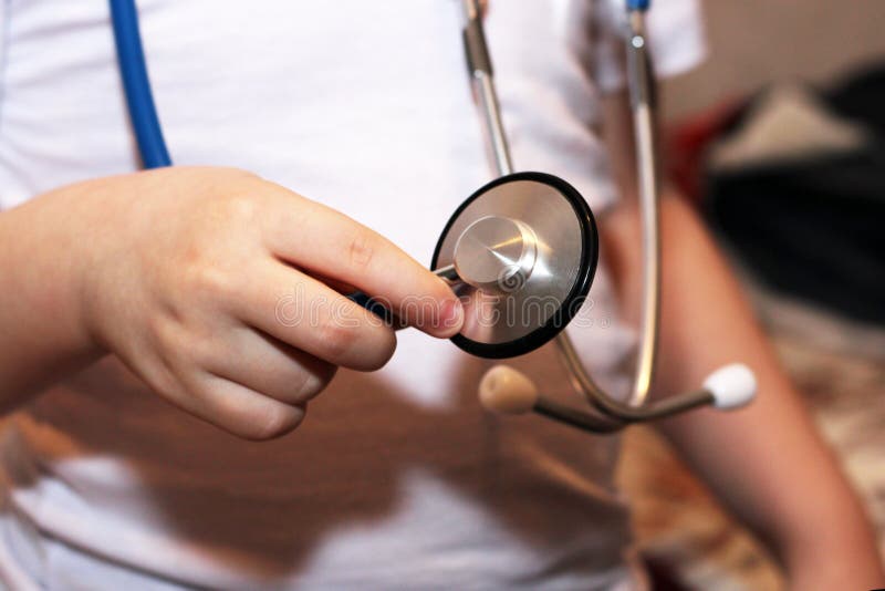 Medical Instruments Stethoscope in Hands of Baby Boy Stock Photo ...