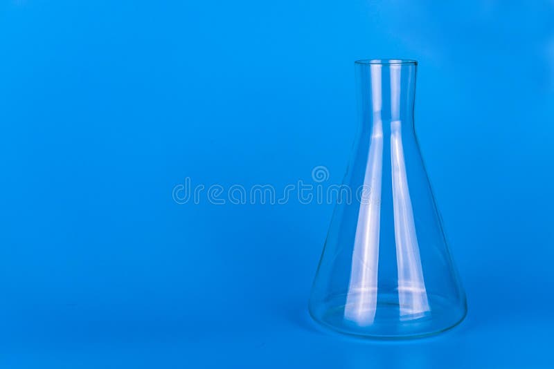Medical Laboratory Flask on a Blue Background. Copy Space Stock Photo ...