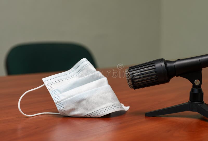 Medical Mask in Front of Microphone in Studio Stock Image - Image of ...