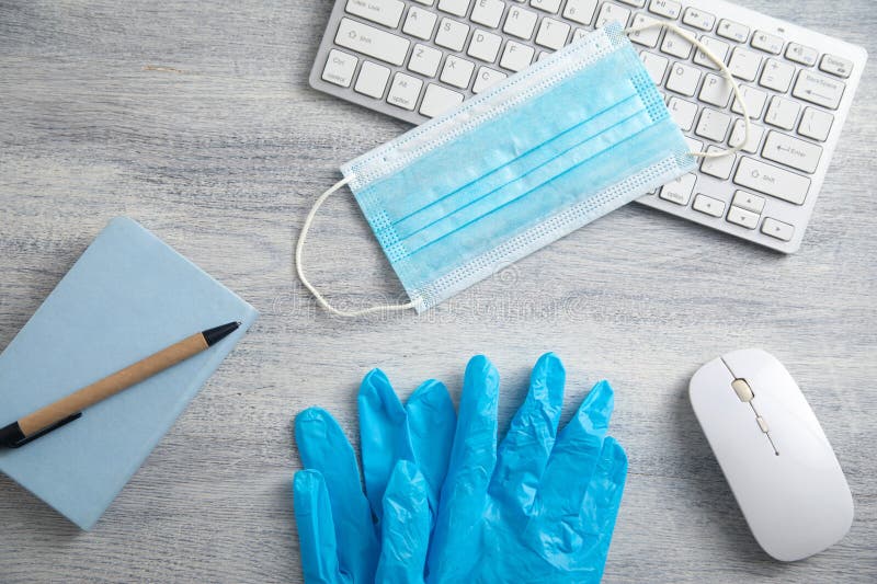 Medical Mask, Gloves and Computer Keyboard on the Table Stock Photo ...
