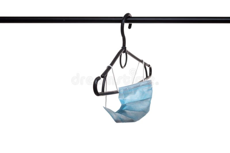 Medical Mask Hanging on Clothes Hangers. Medical Mask Isolate. Side ...