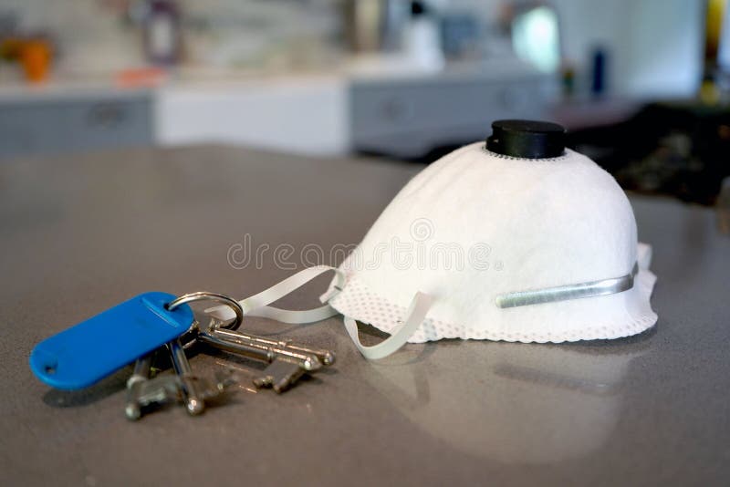 Medical Mask and House Keys on Kitchen Counter Stock Image - Image of ...
