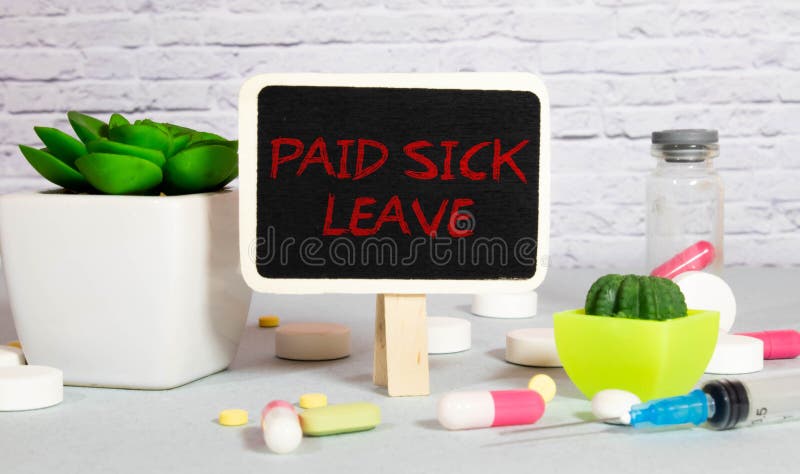 Medical Mask with the Inscription Paid Sick Leave Stock Image - Image ...