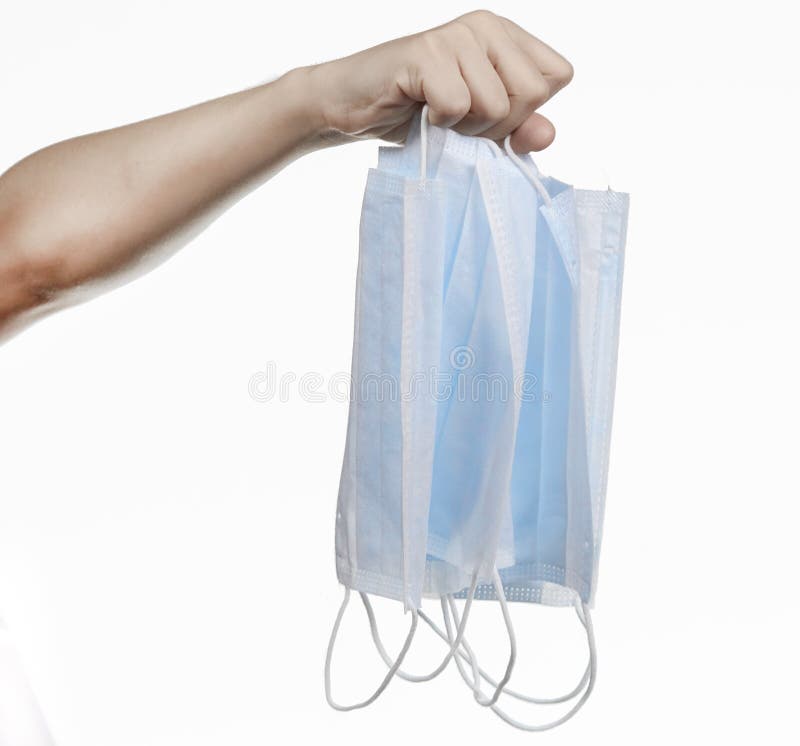 Medical Masks in Hand on a White Background Isolate Stock Photo - Image ...