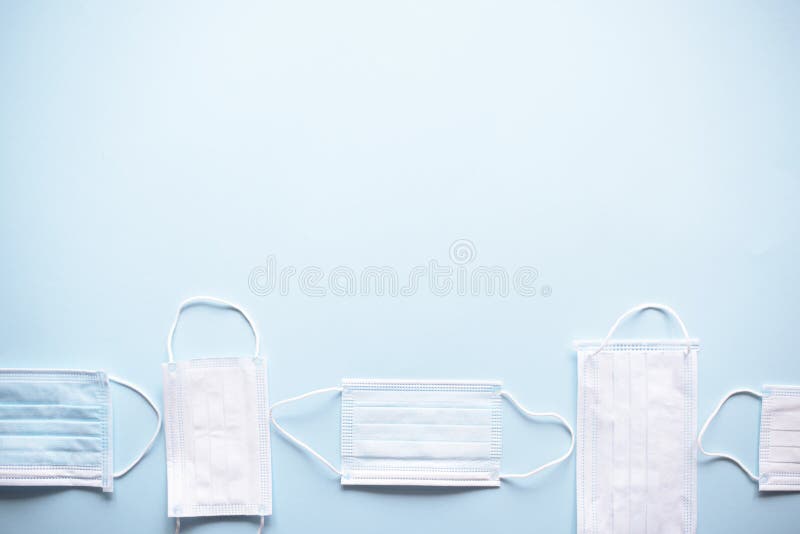 Medical Masks on a Light Blue Background Stock Photo - Image of care ...