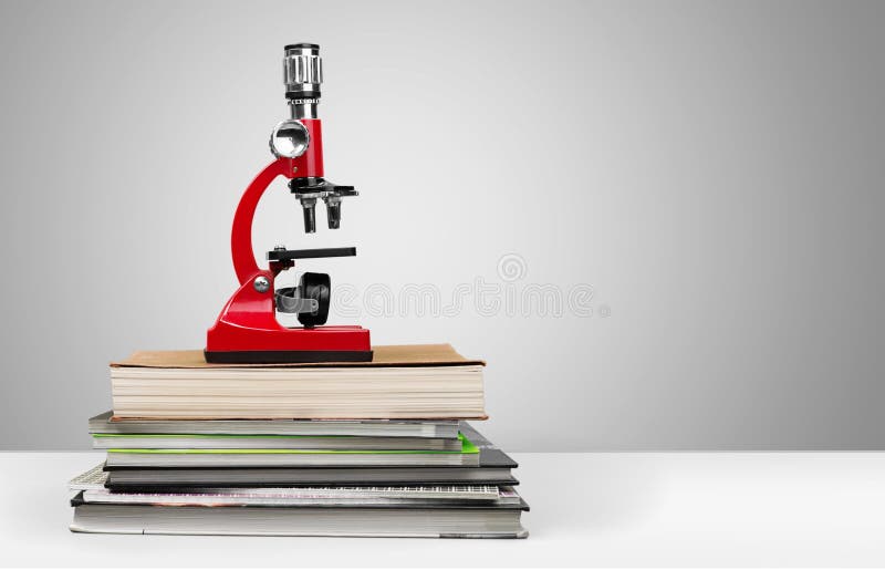 Medical Microscope and Books on Light Background Stock Photo - Image of ...