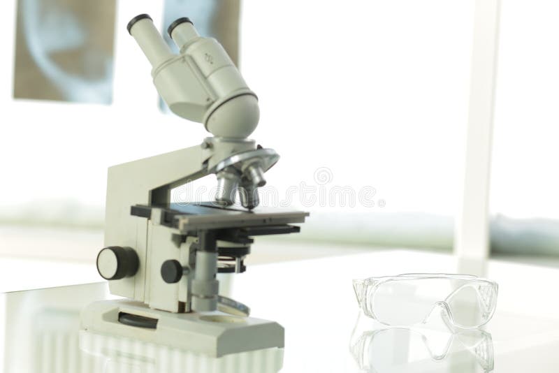Medical Microscope Stands on a Glass Table in a Medical Laboratory ...