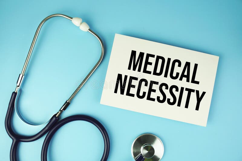 Medical Necessity Text on Paper Card with Stethoscope Top View on Blue ...